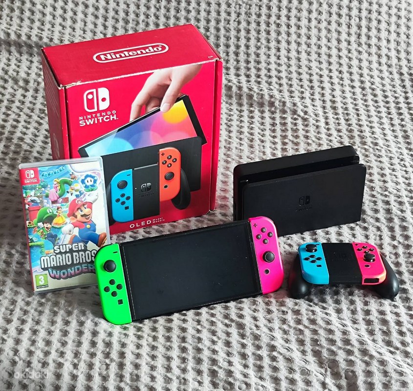 Nintendo Switch OLED + JOYCONS + SUPER MARIO BROS. WONDER - Tallinn ...